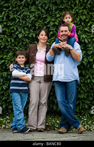 Filipino father and son hugging Stock Photo - Alamy
