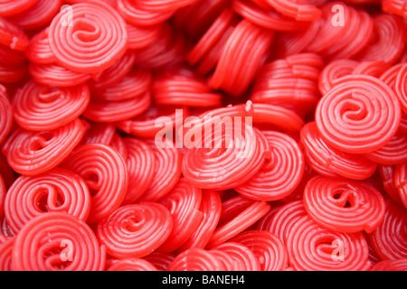 Red Licorice wheels candies. Candy flavored licorice Stock Photo - Alamy