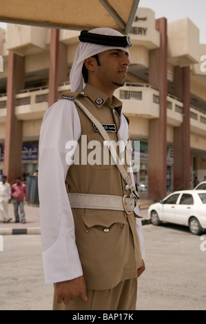 A policeman directing traffic in Qatar s Souq Waqif retro styled ...
