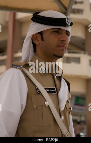 A policeman directing traffic in Qatar s Souq Waqif retro styled ...