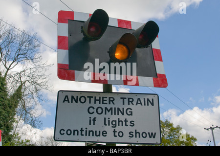 Amber Warning Lights Flashing at a Railway Level Crossing Stock Photo ...