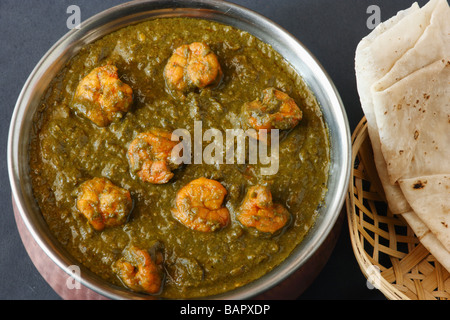 Saag Prawn is prepared from Prawns cooked in Palak gravy (Spinach) and ...