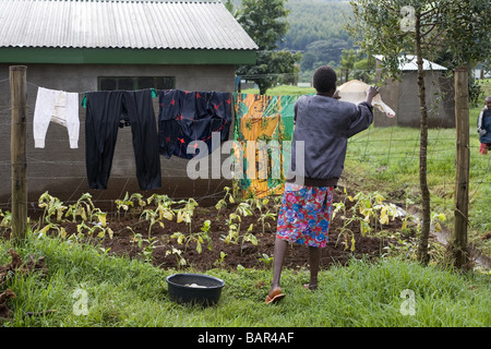 Wet washing hanging on a clothes line during the rain Stock Photo - Alamy