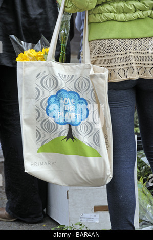 A Primark green recycled carrier bag Stock Photo - Alamy