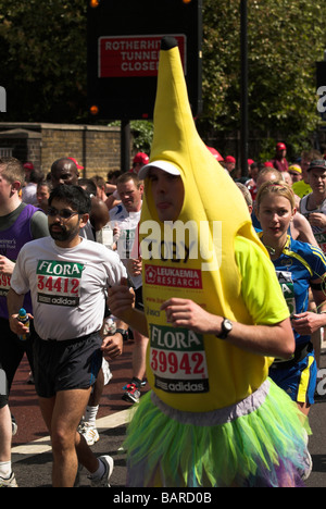 A charity runner, dressed as a banana, in the 2011 London Marathon, and ...