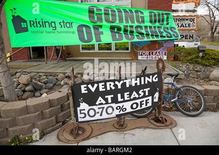 A 'Going Out Of Business' sign outside of a Boston Store retail store ...