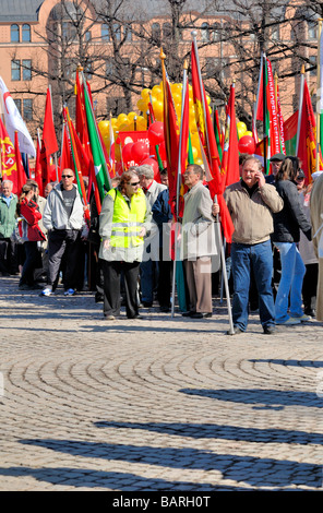 The Finnish labour union, SAK, May Day parade with the red union flag ...