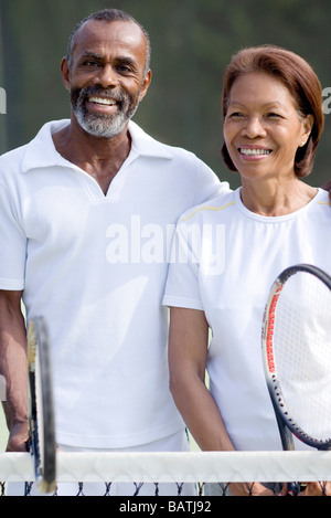 Tennis, fitness and portrait of couple with smile standing on court in ...