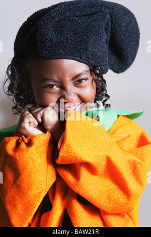 A vertical shot of a person with a pumpkin head Stock Photo - Alamy