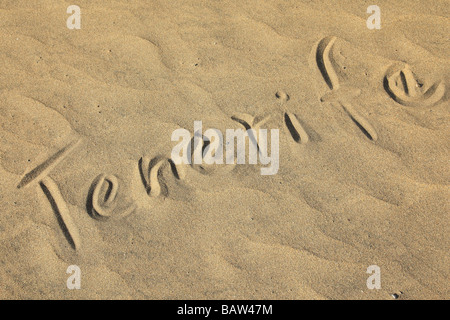 Tenerife beach word written in sand Stock Photo - Alamy