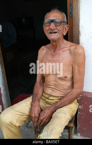 Portrait of elderly Cuban man with big cigar in Trinidad Stock Photo ...