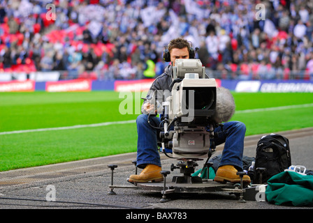 Television Cameraman filming a Football match. Picture by James ...