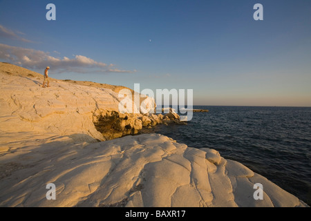 White rocks along the coast at Governors Beach, in the evening light ...
