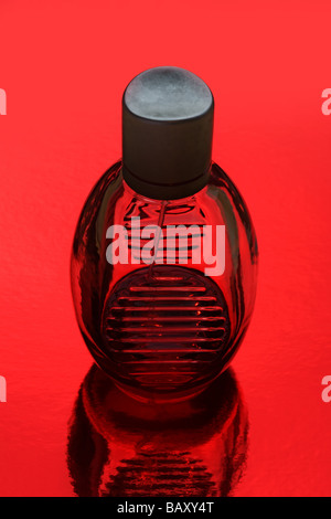 red perfume bottle Stock Photo - Alamy