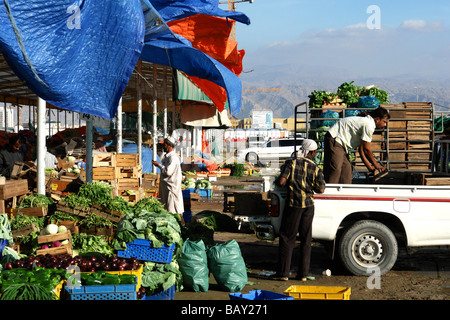 Ras Al Khaimah UAE Men Stacking Shelves In Supermarket Stock Photo - Alamy