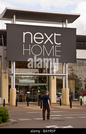 Next shop clothing and home store sign logo Stock Photo - Alamy