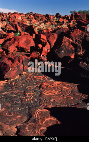 Ancient aboriginal rock art engravings, symbols of initiation rites, on ...