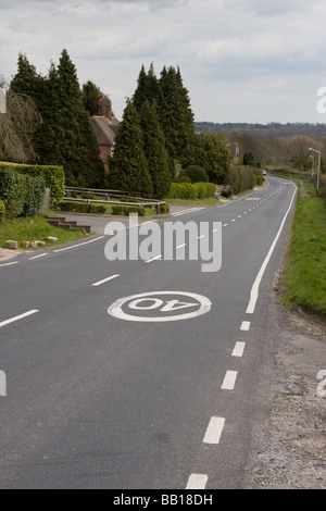 The speed limit sign is painted on the road with white paint. Close-up ...