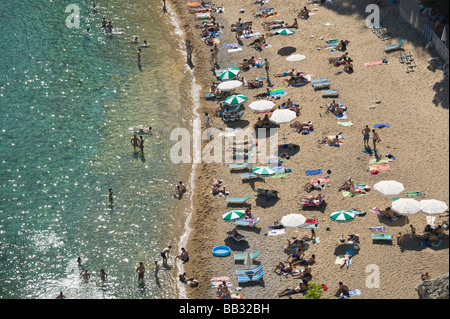 Aerial view of Budva Montenegro beach with sunshades and swimmers Stock ...