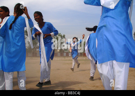 Pakistani schoolgirls in school uniform of The Aga Khan School for ...