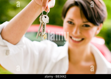 Woman looking for her lost keys Stock Photo - Alamy