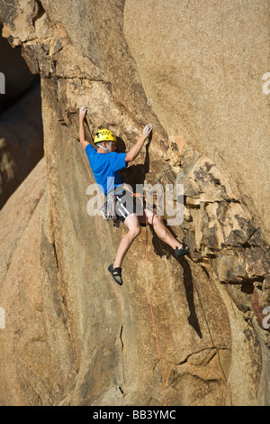 Climber scaling an overhanging rock face Stock Photo - Alamy
