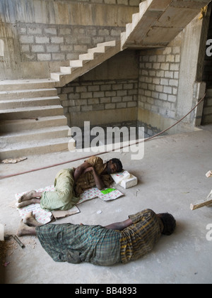 Workers sleeping on a construction site Stock Photo - Alamy