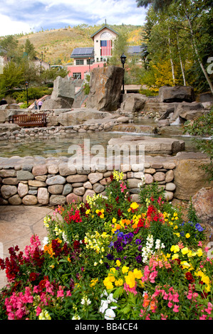 Vail Colorado town in colorful autumn fall with foreground of spruce ...