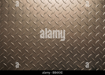 Diamond plate steel background. Commonly used as a tread pattern or ...
