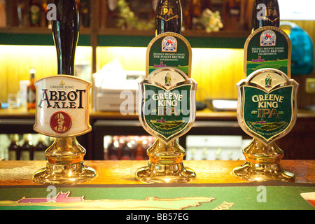 Greene King IPA beer pump label badges Stock Photo - Alamy