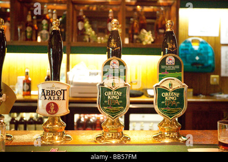 Greene King IPA beer pump label badges Stock Photo - Alamy