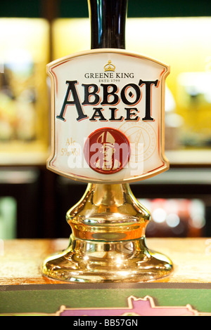 A beer pump clip for Greene King Abbot Ale Stock Photo - Alamy