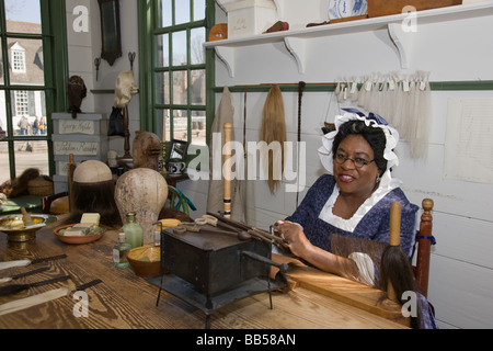 A woman makes a wig in the Barber & Peruke Maker Shop at Colonial ...