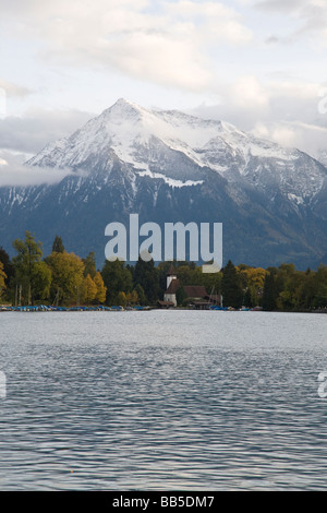 Autumn view of the Lake Thun, Niesen mountain (so called Swiss Pyramid ...