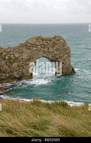 Durdle Door (sometimes Durdle Dor) is a natural limestone arch on the ...