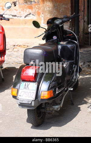 Two Vespa scooters in Rome, Italy Stock Photo - Alamy
