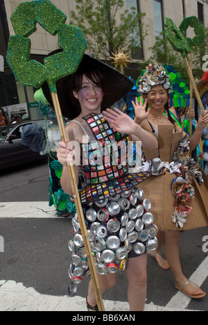 Climate activists dressed in costumes and dinosaur fossils perform ...