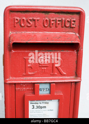 British Red Post Box ERII with crochet ww2 soldier topper Stock Photo ...
