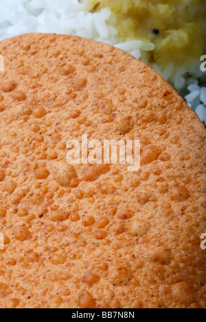 Papad is a thin, crispy Indian preparation sometimes described as a ...