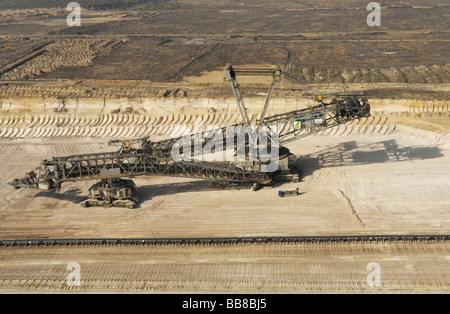 Huge bucket wheel excavator mining for brown coal in an open pit mine ...