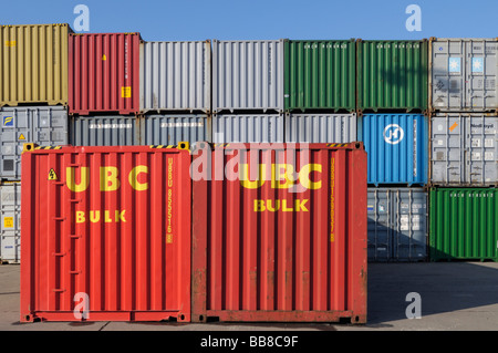 Container depot, stacked standard ISO containers and tank containers ...