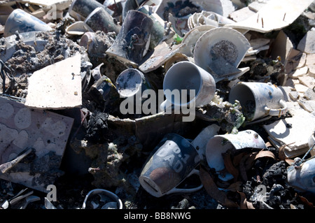 Remains of household objects molten glass after a devastating bushfire ...