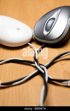 Two computer mouse cords tied together Stock Photo - Alamy