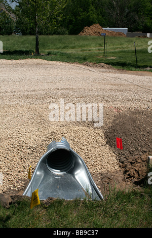 Drainage pipe: New culvert under small country side gravel road Stock ...