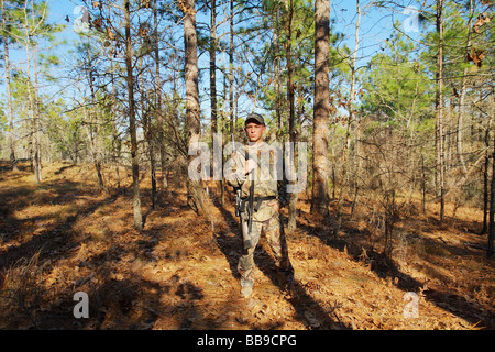 USA, Georgia, Hunter standing in forest Stock Photo - Alamy