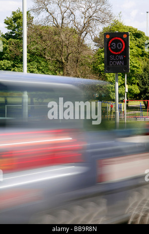 Flashing slow sign Stock Photo - Alamy