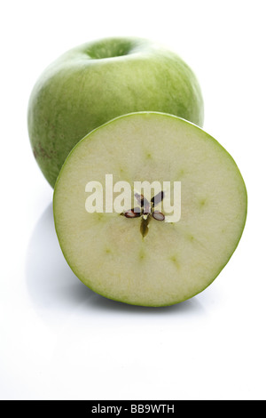 One half of the sliced green apple isolated on a white background Stock ...