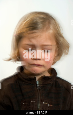 Vertical portrait of sad, crying little kid, boy with close eye. Bad ...