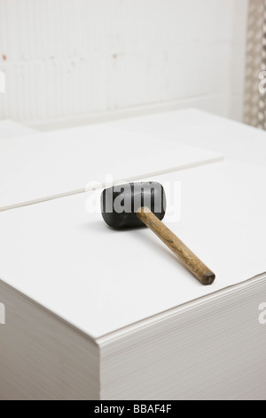 Close up of a rubber mallet on the new concrete pavement, building a ...