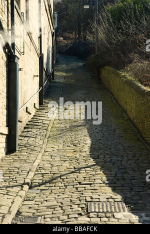 road uphill leading into an old town Stock Photo - Alamy